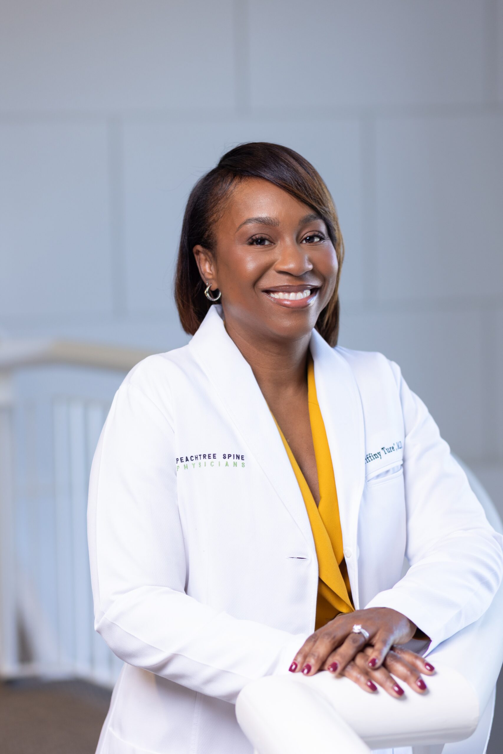 Tiffiny Ture', MD - Peachtree Spine & Sports Physicians